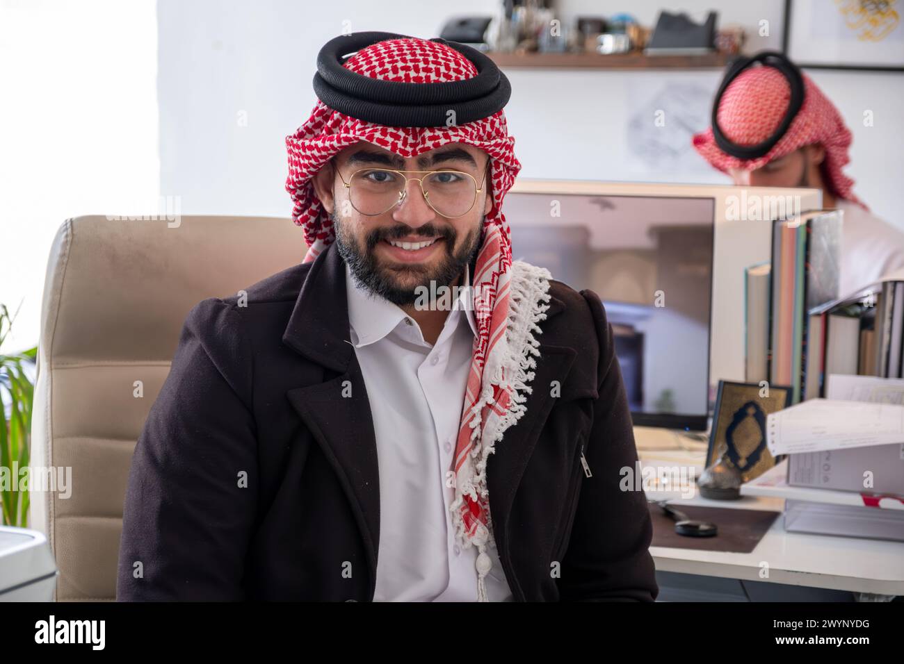portrait for arabic male during work in office with smile on his face ...