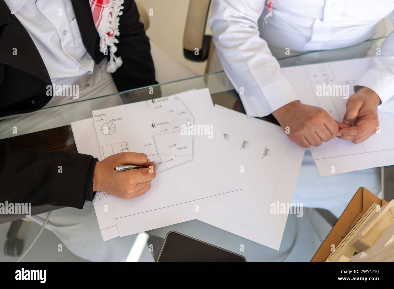arabian males working on designs for buildings Stock Photo - Alamy