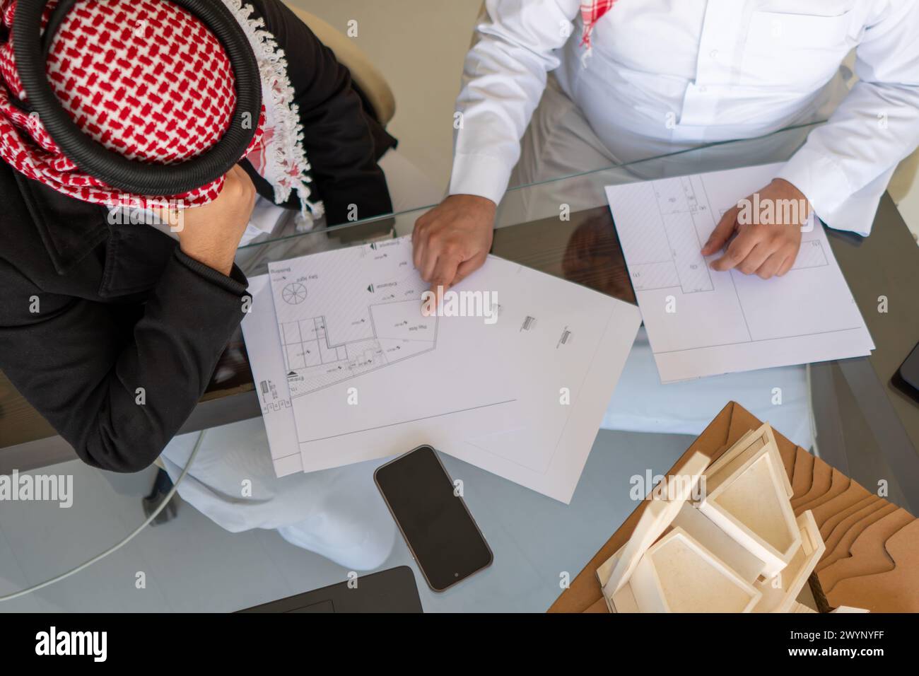 arabian males working on designs for buildings Stock Photo - Alamy