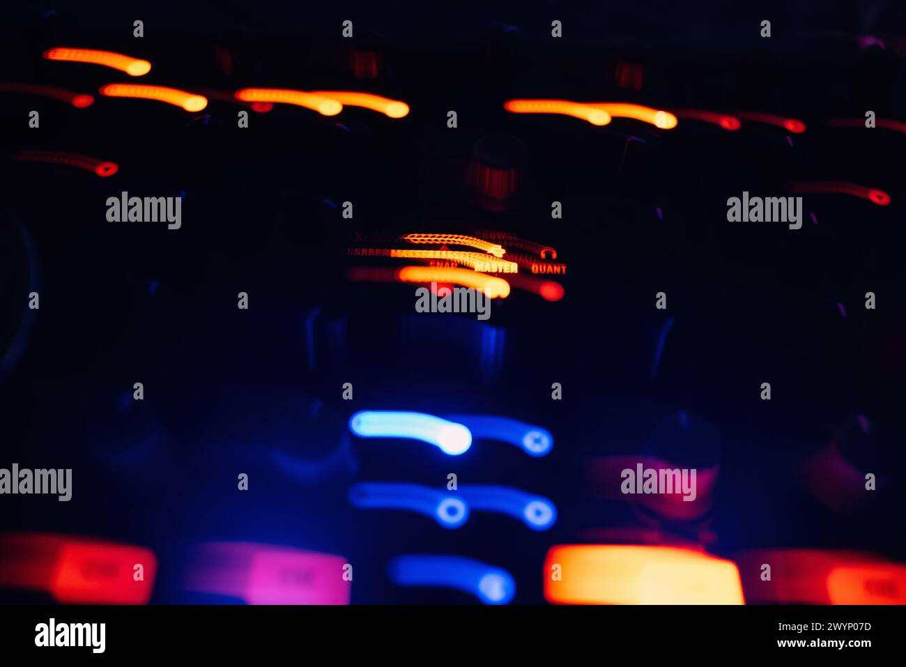glowing lights from DJ mixer music remote buttons Stock Photo - Alamy