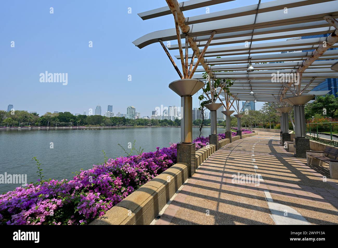 Scenic stretch along running track at Lake Ratchada in Benjakitti Park ...