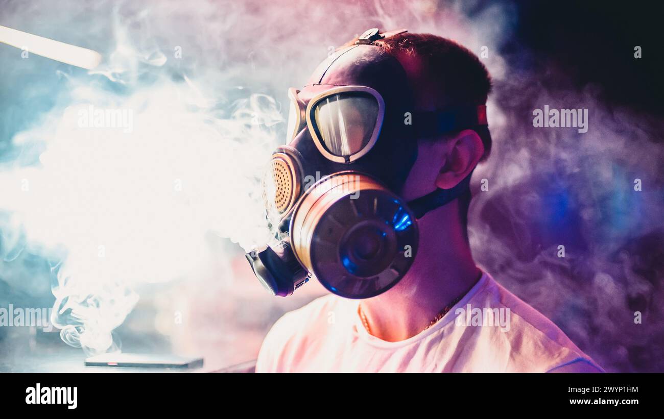 Girl in gas mask smoke hi-res stock photography and images - Alamy