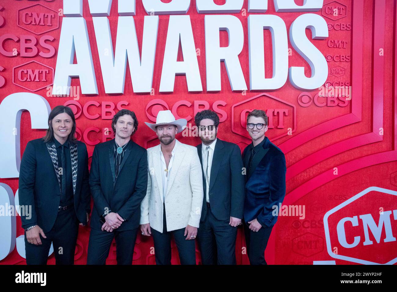 Members of the country music group NEEDTOBREATHE pose on the red carpet ...