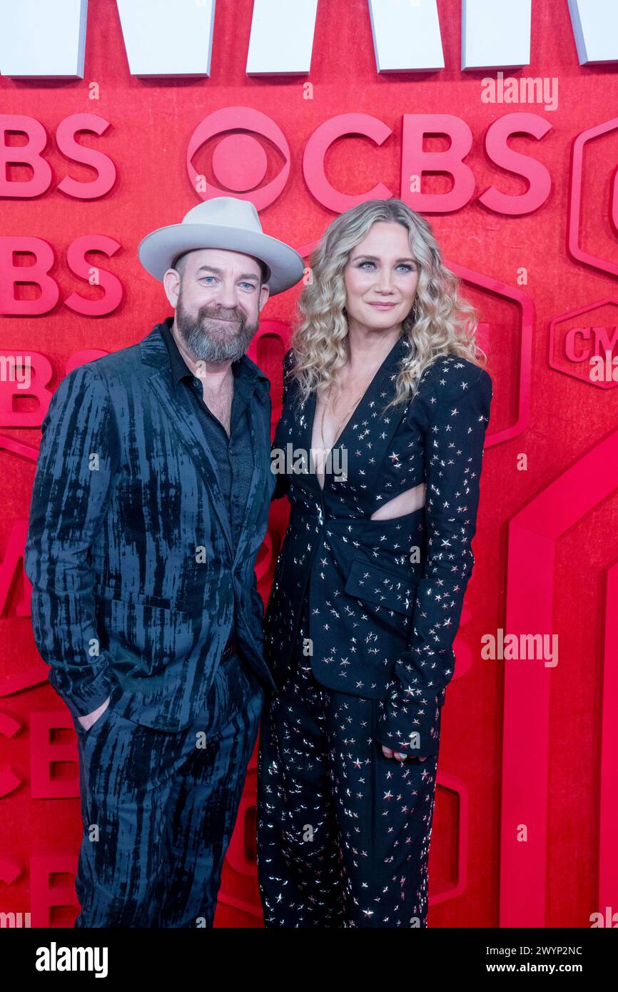 Members of the country music group SUGARLAND pose on the red carpet for ...