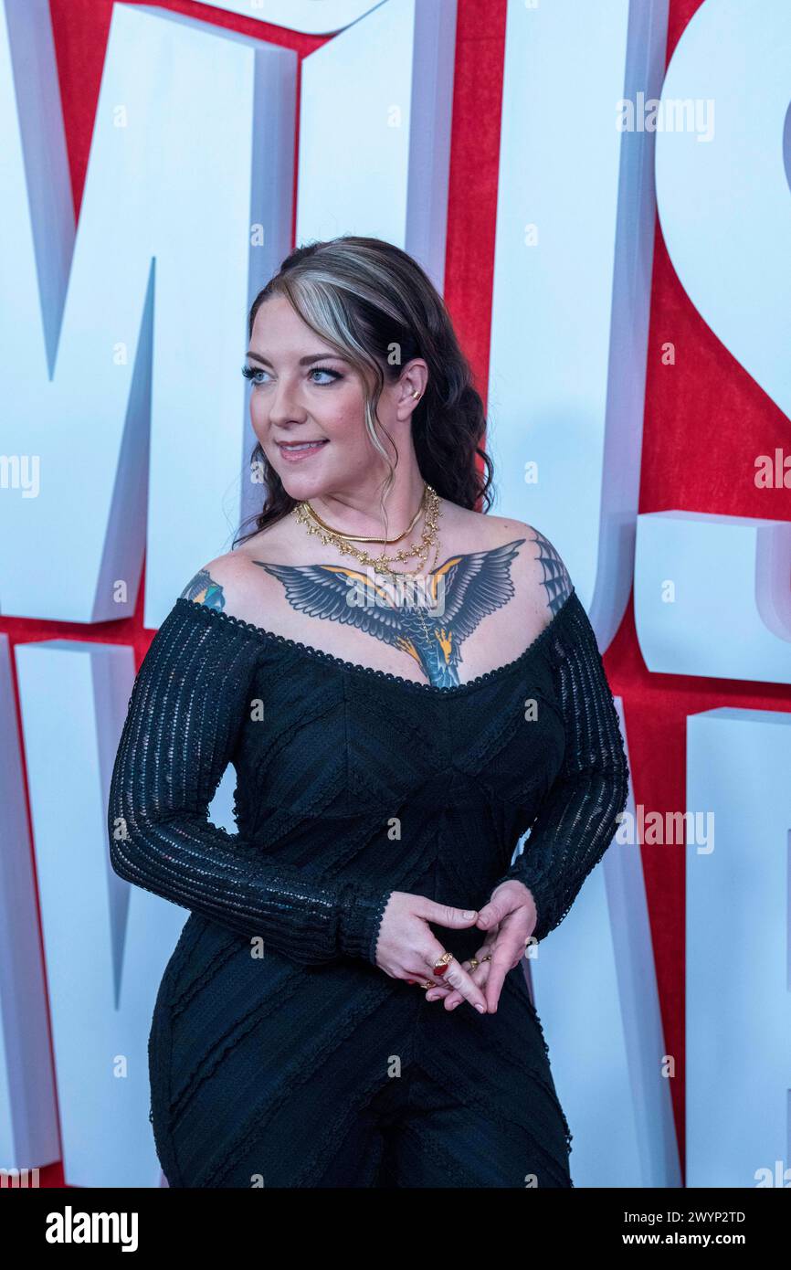 Country singer ASHLEY MCBRYDE walks the red carpet and poses for ...