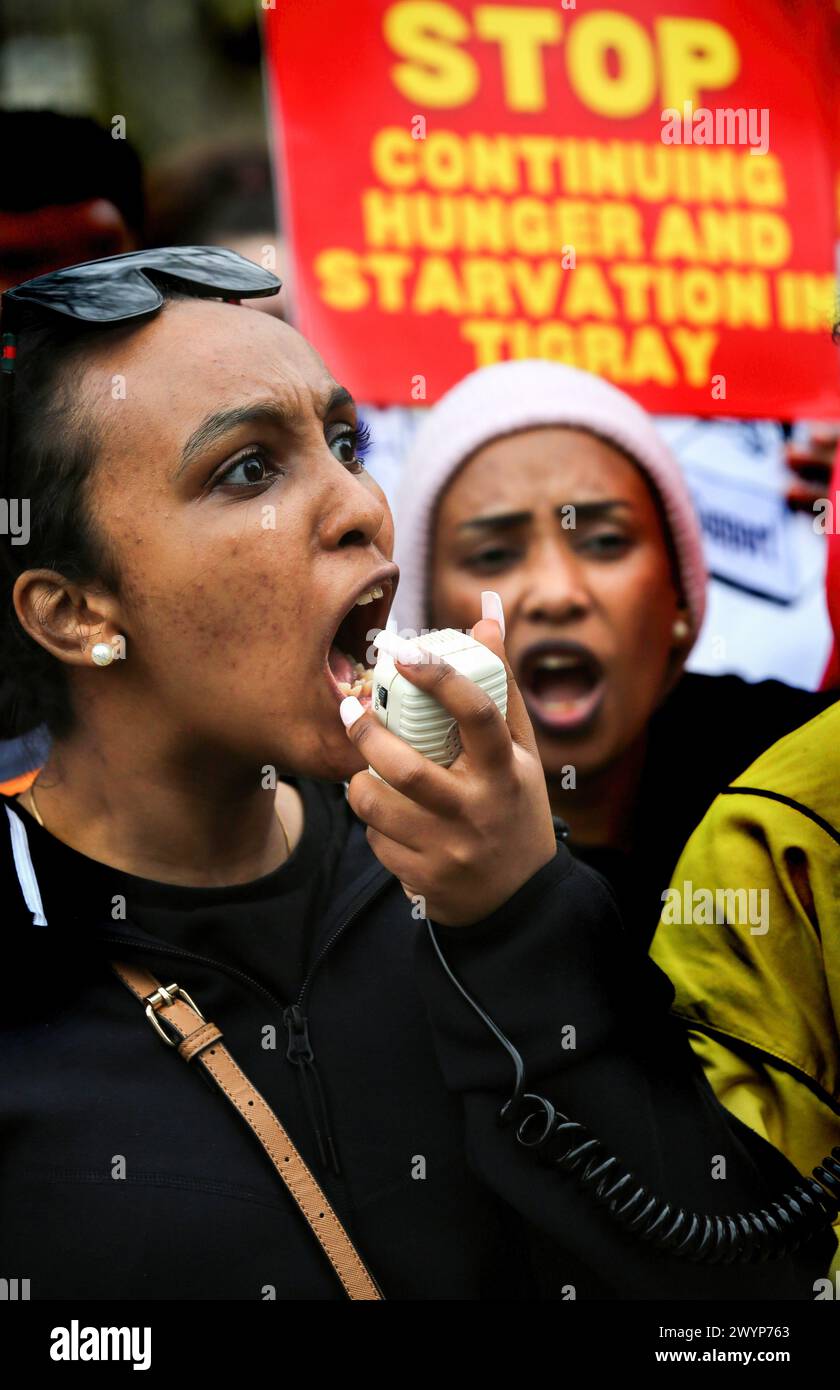 London, UK. 06th Apr, 2024. A protester shouts through a megaphone ...