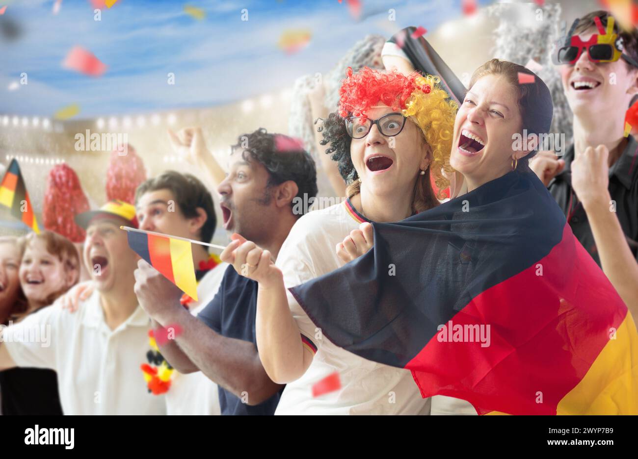 Germany football supporter on stadium. German fans on soccer pitch ...