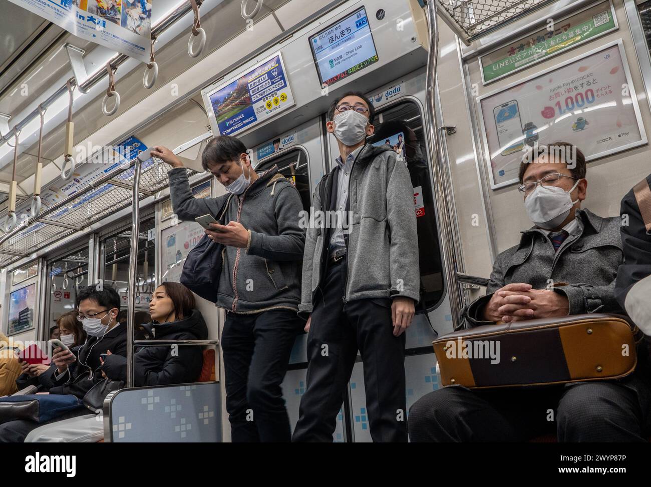 Passengers on the subway Osaka Metro underground trains, Japan Stock ...