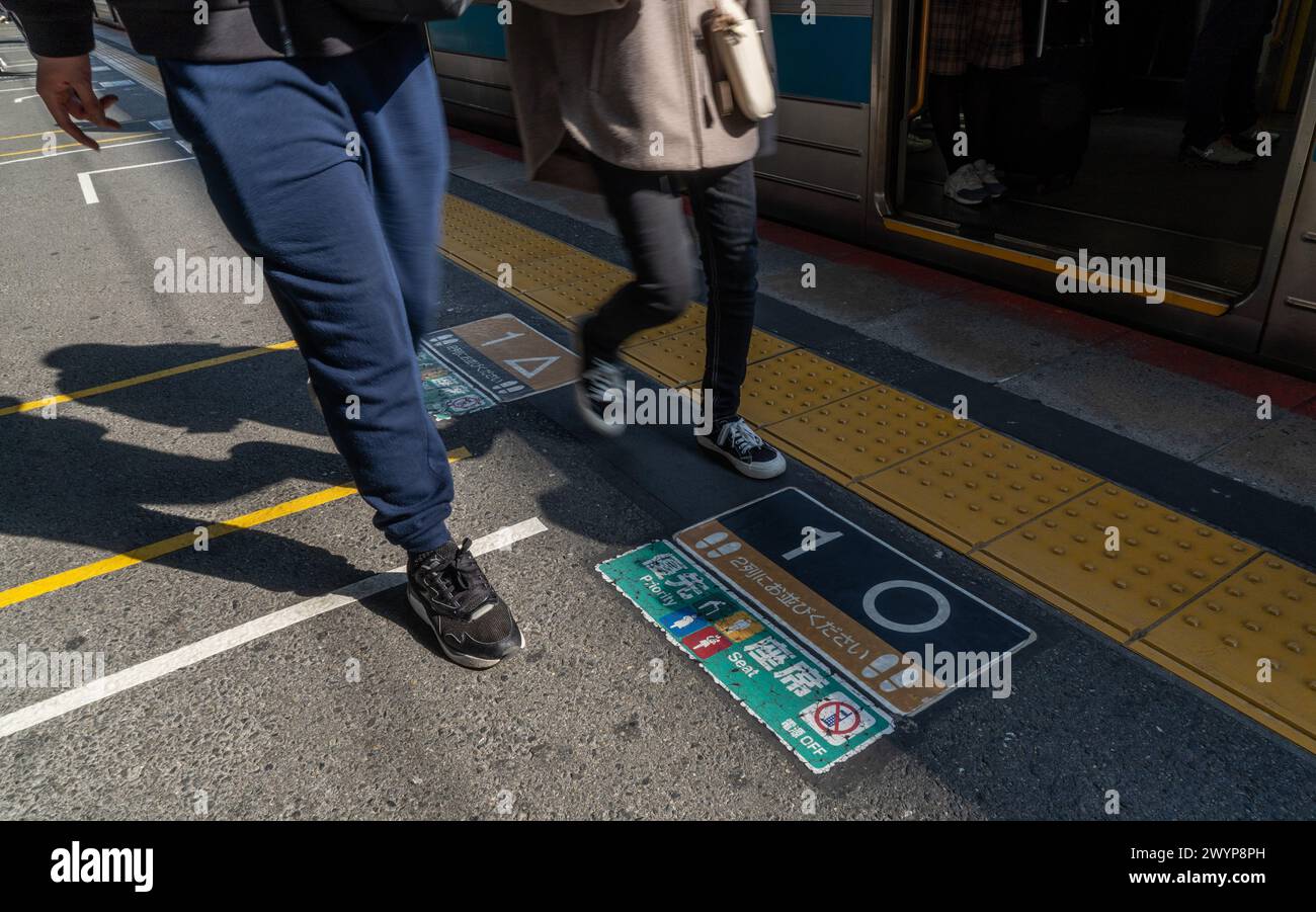 Passengers on train platform in Osaka,Japan Stock Photo - Alamy