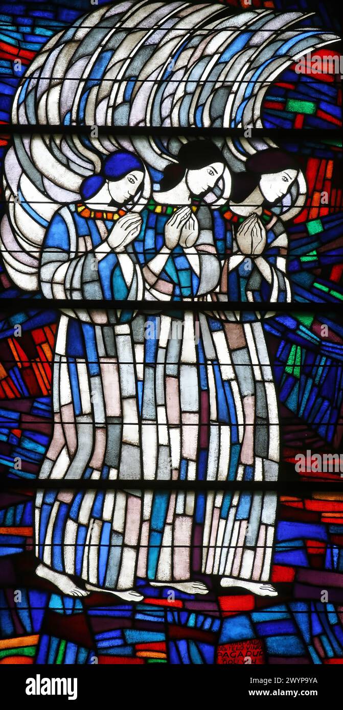 Angels, stained glass window in church parish church of the Saint ...
