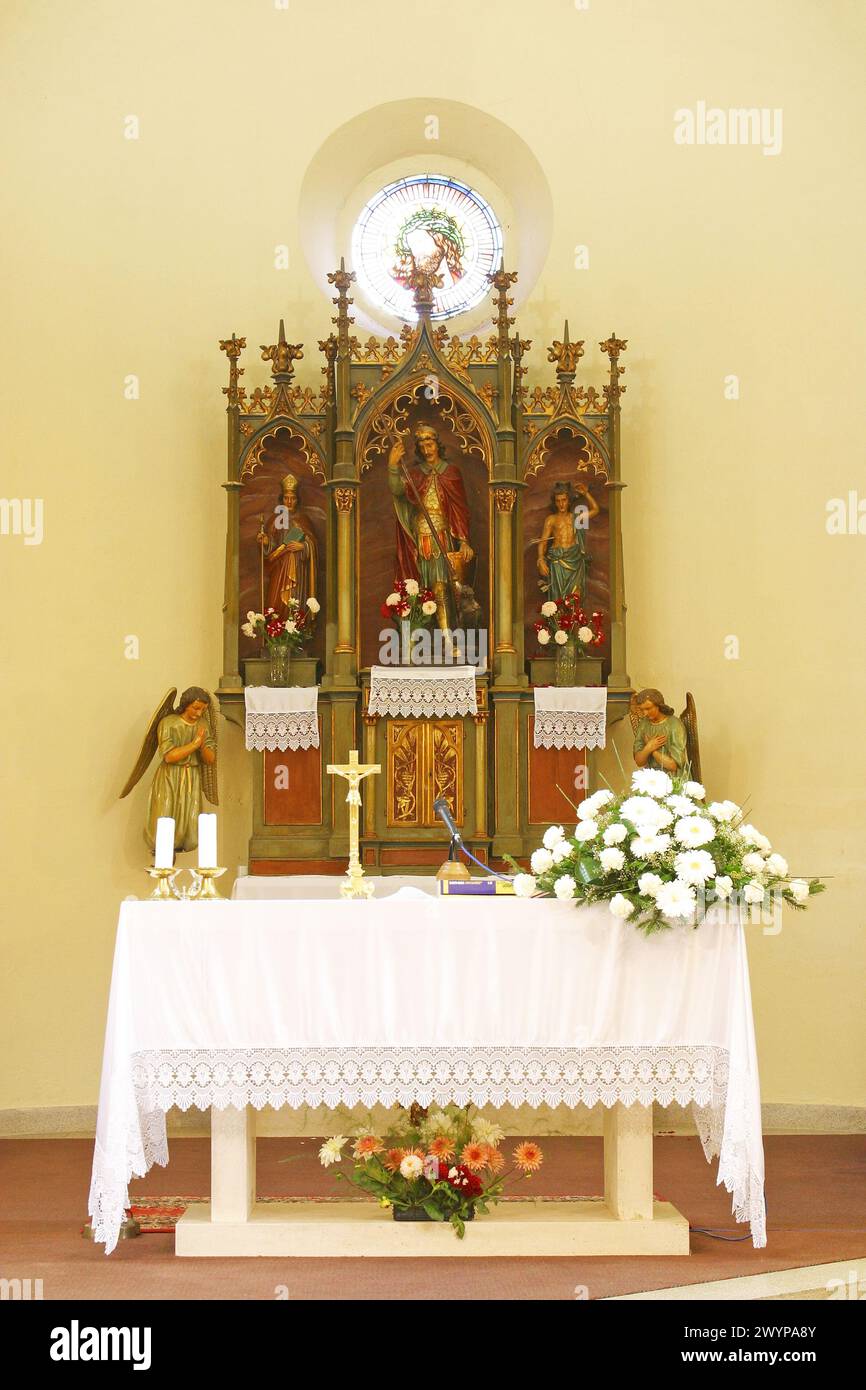 Main altar in the parish church of St. George and the Immaculate Heart ...
