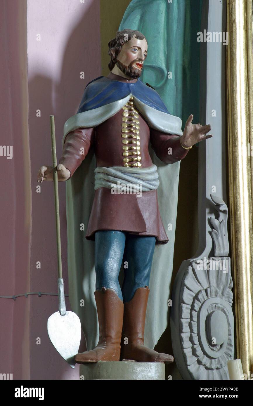 Saint Isidore the Farmer statue at the altar in the Parish Church of ...