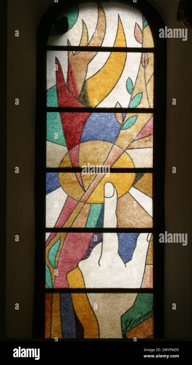 Finger of God, stained glass window in parish church Assumption of the ...