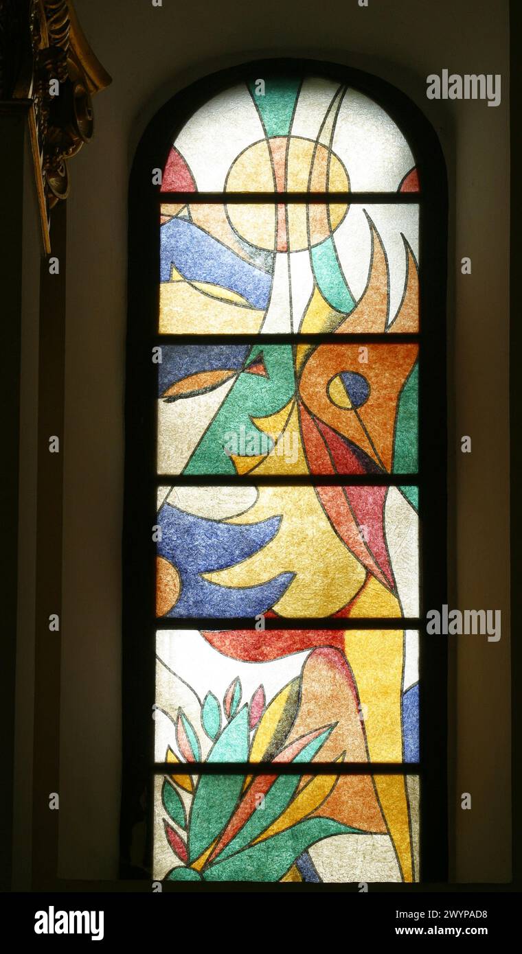 The act of creation, stained glass window in parish church Assumption ...