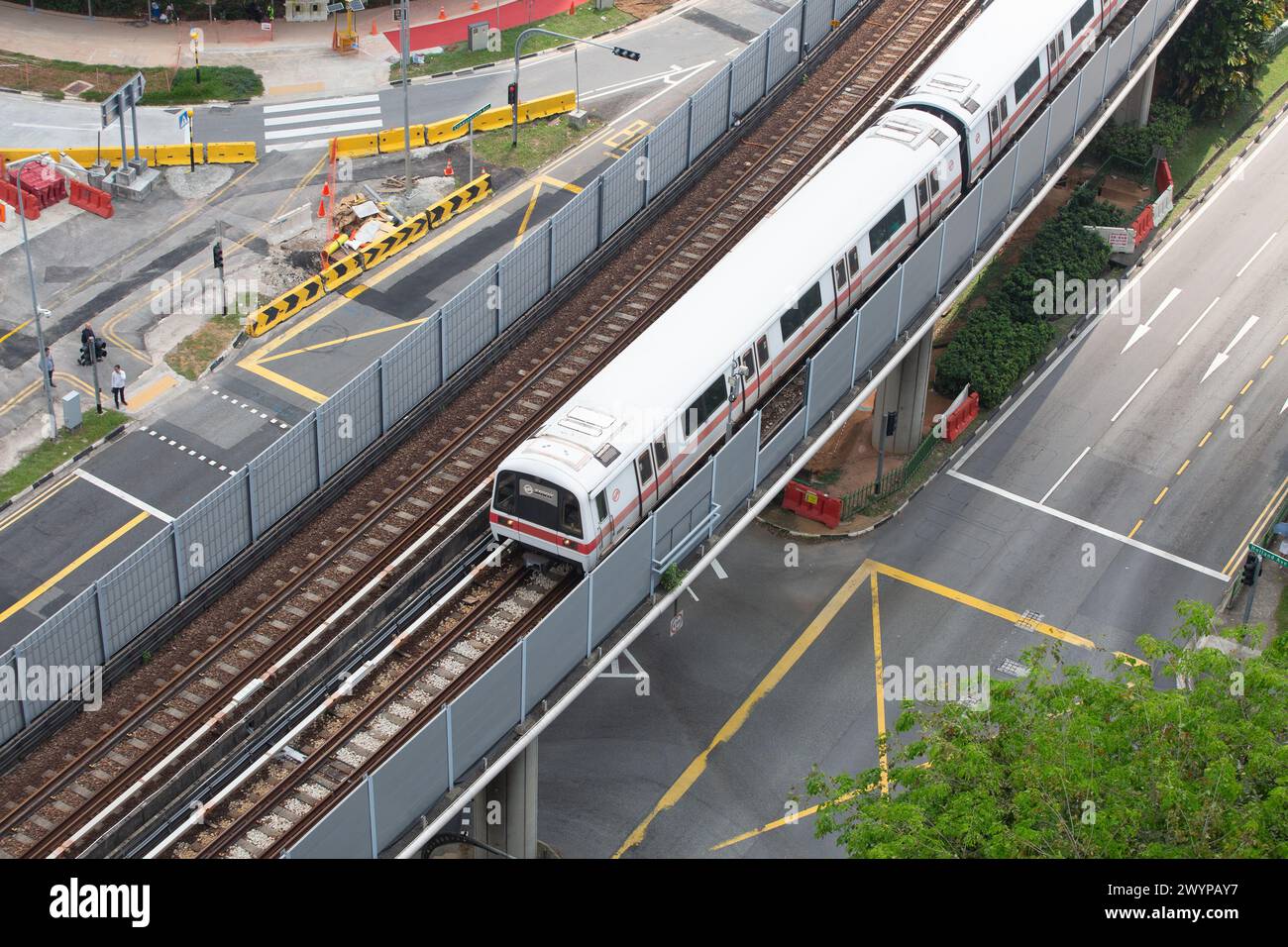 Aerial view of a train and the road infrastructure. A most convenient ...