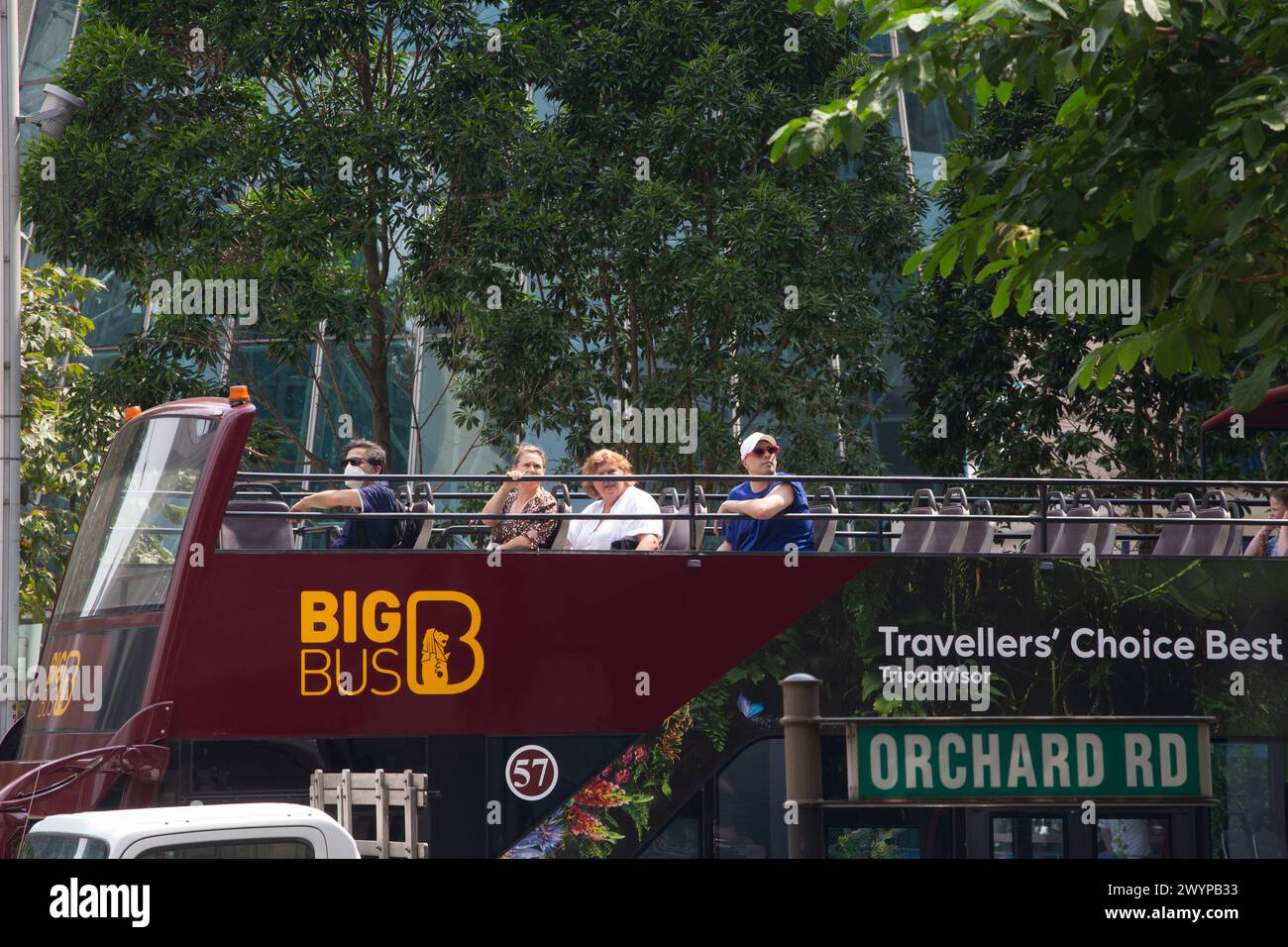 Holiday tourists touring on a Big Bus Tour, on the second level open ...