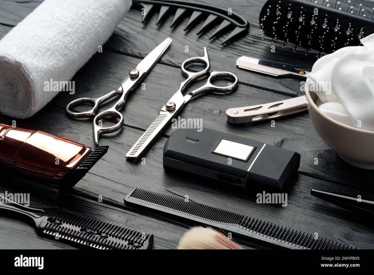 Professional Barber Tools Laid Out on Dark Wooden Surface Stock Photo ...