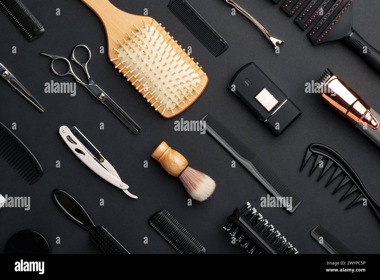 Variety of Hair Styling Tools and Accessories Displayed on a Dark ...