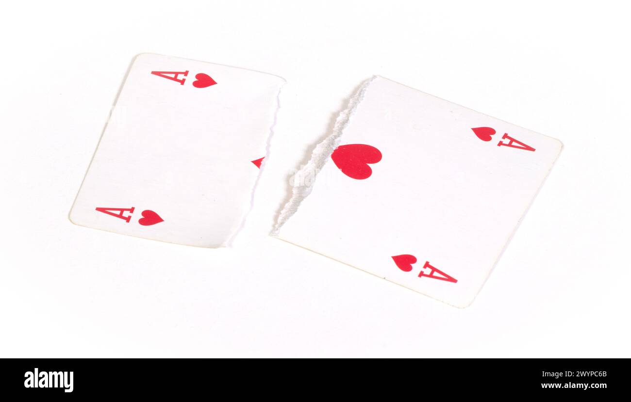 Playing card, torn in pieces, isolated on white Stock Photo - Alamy