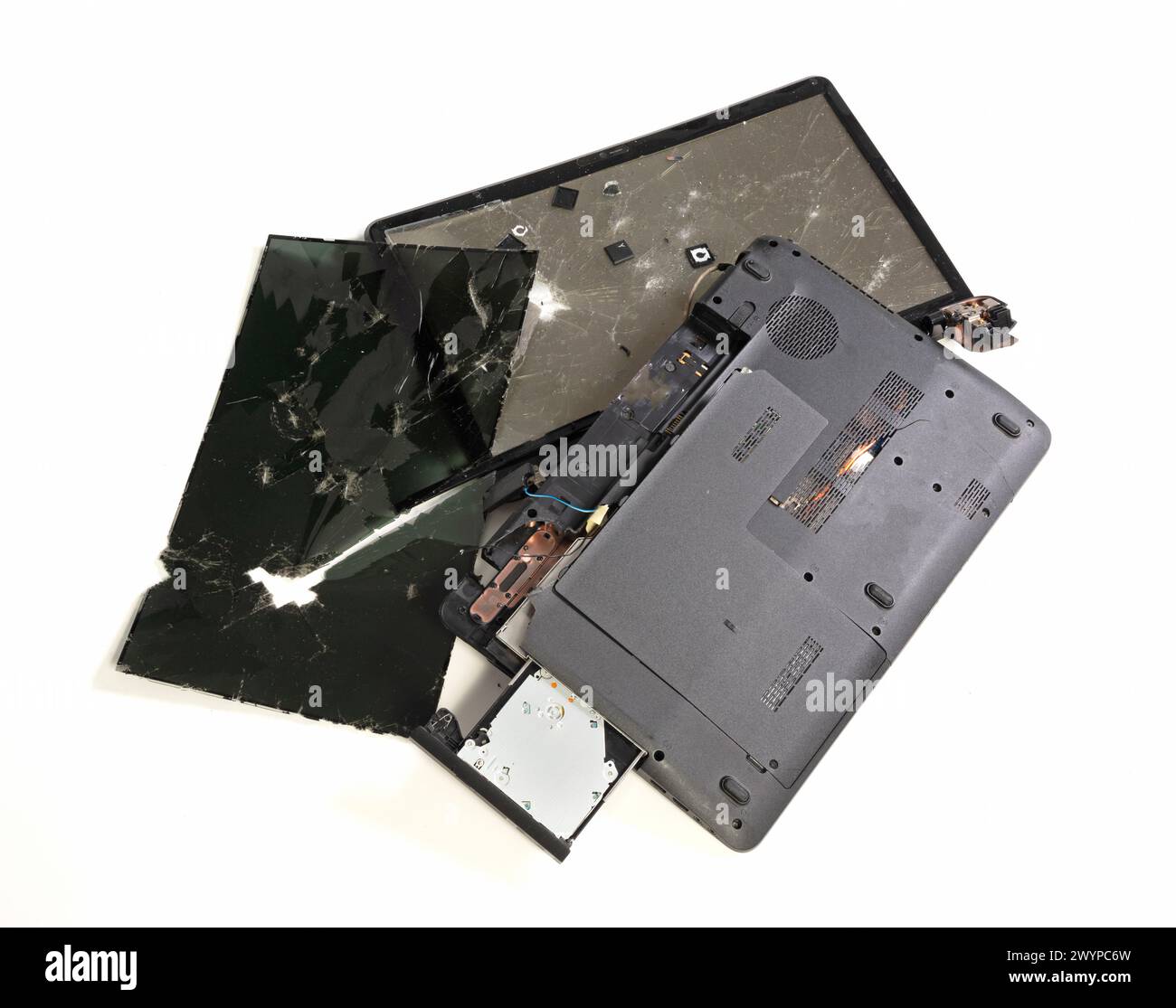 Old broken laptop isolated on white a background Stock Photo - Alamy