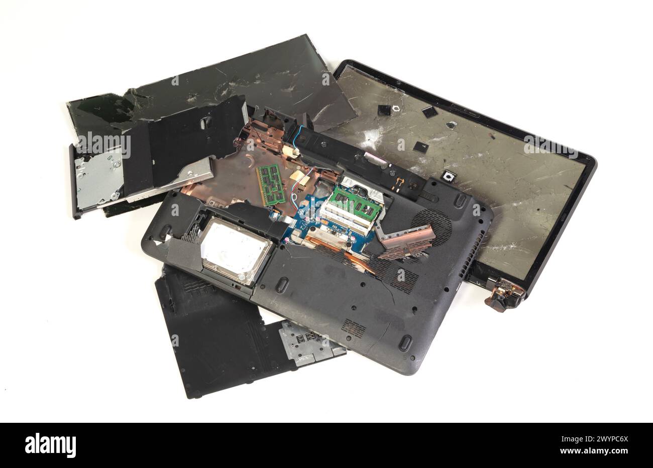 Old broken laptop isolated on white a background Stock Photo - Alamy