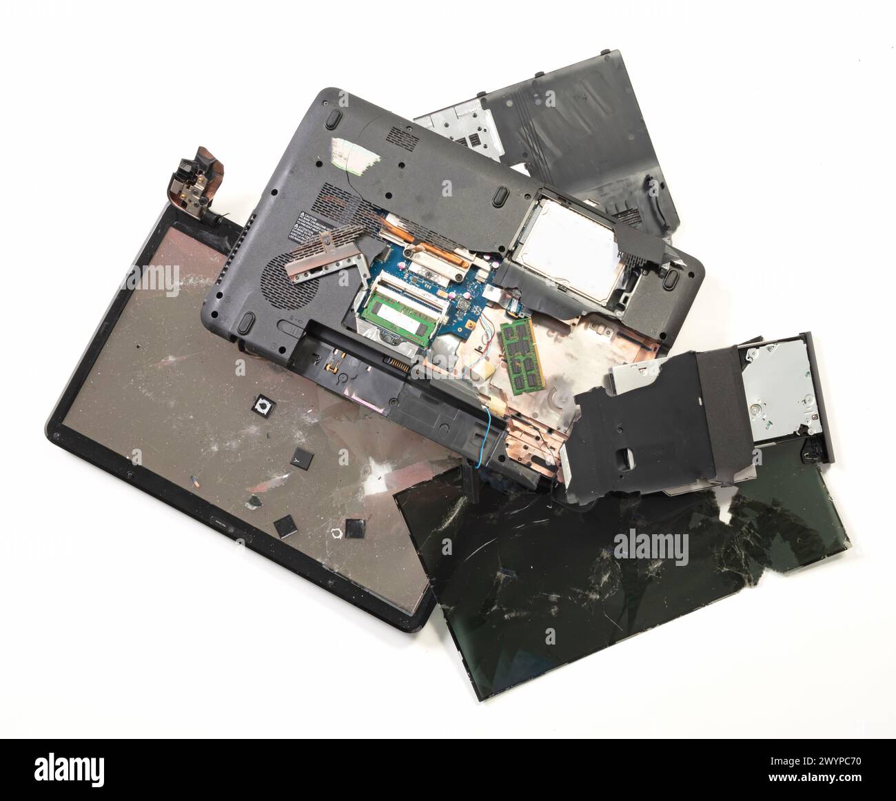 Old broken laptop isolated on white a background Stock Photo - Alamy