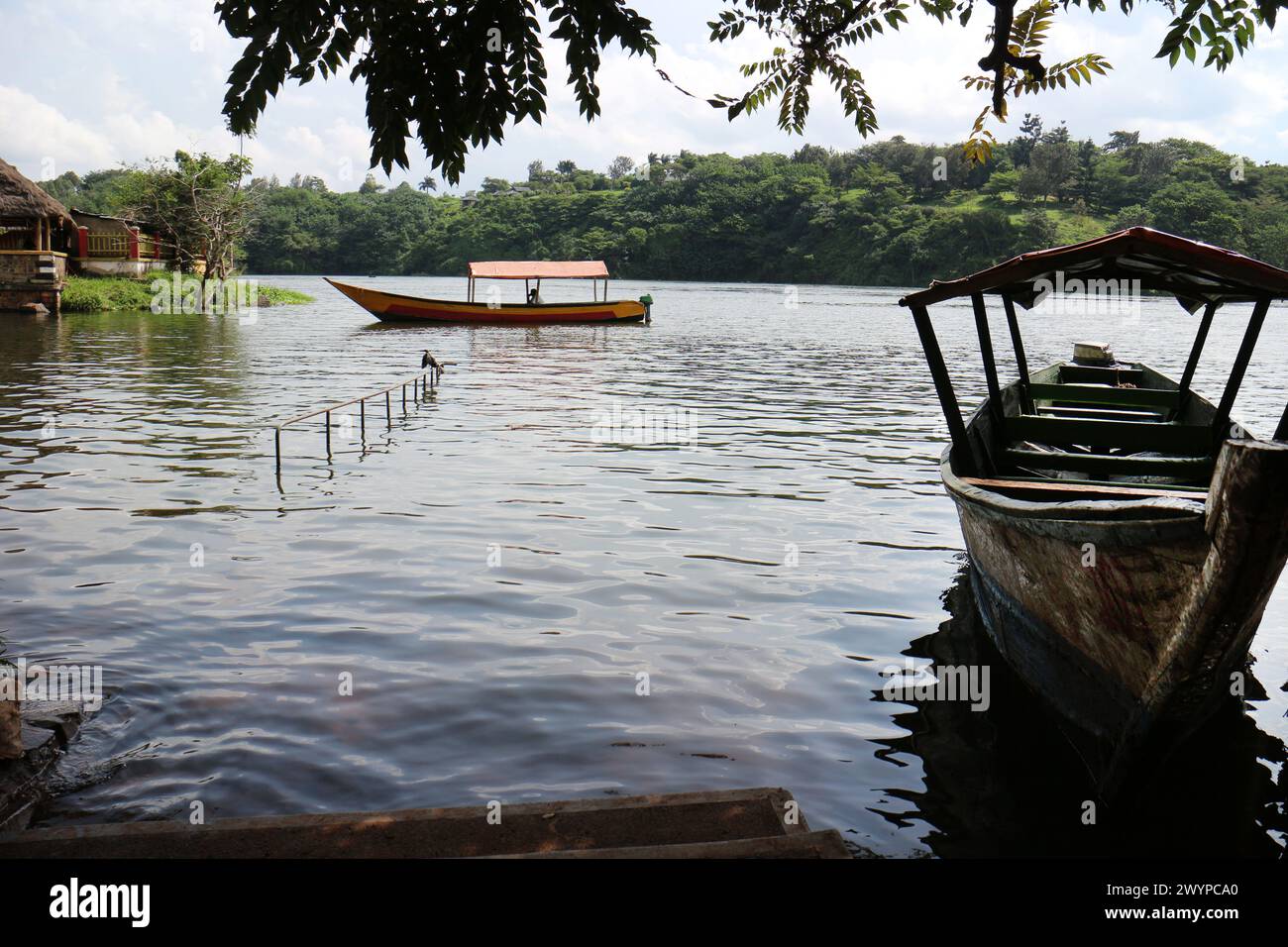 Nile river - Uganda. A small boat on the Nile Stock Photo - Alamy