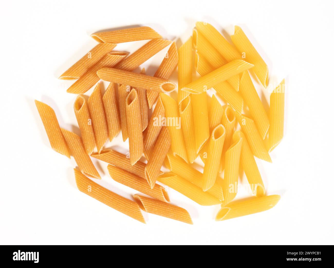 Pasta Penne Rigate (whole-weat and regular pasta), isolated on white ...