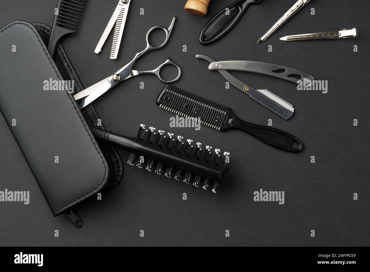 Variety of Hair Styling Tools and Accessories Displayed on a Dark ...