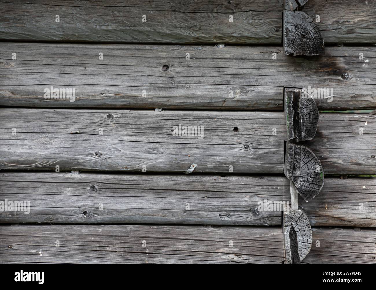 The Angular Part Of A Wooden House Made Of Logs In The Picture Shows A