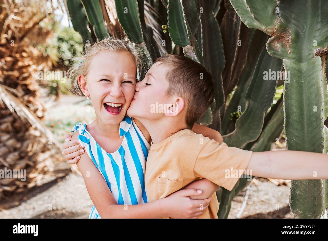 Portrait of siblings on summer vacation in holiday destination. Happy ...