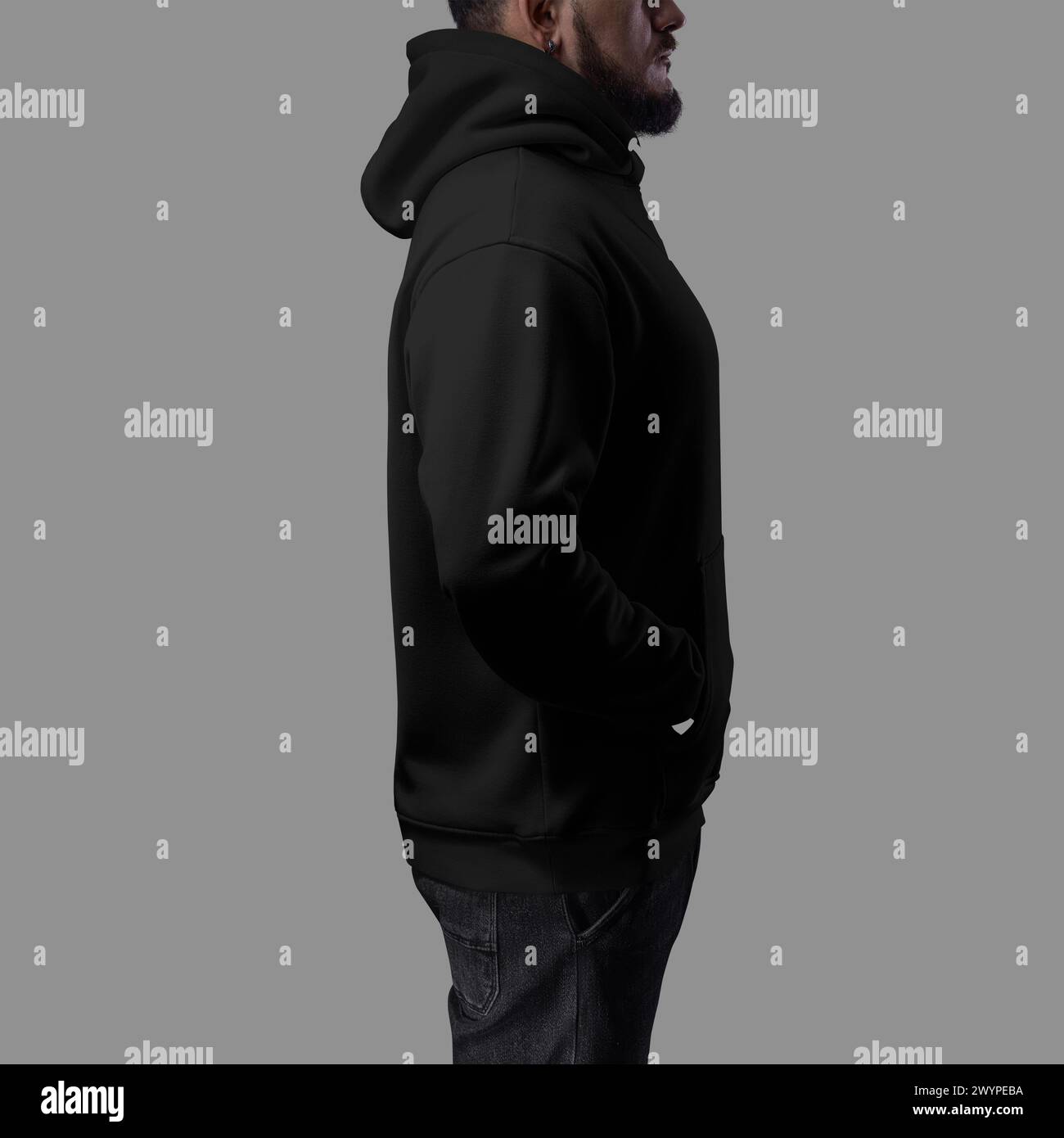 Template of a black oversized hoodie on a man in jeans, side, hood ...