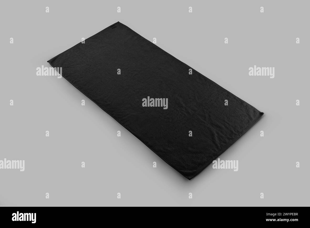 Mockup of a black terry towel for design, branding. Template of fluffy ...