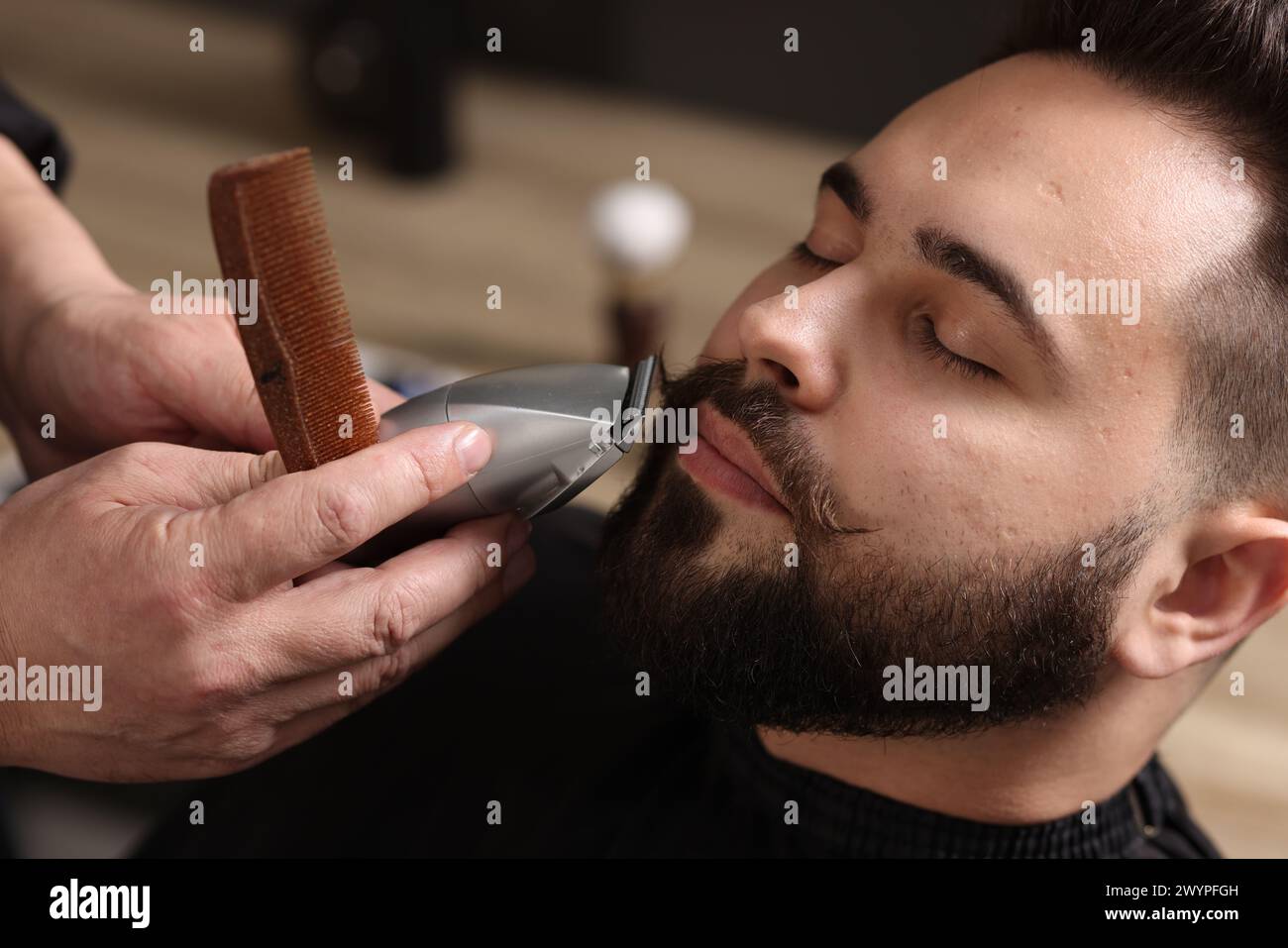 Mustache shaving in barbershop hi-res stock photography and images - Alamy