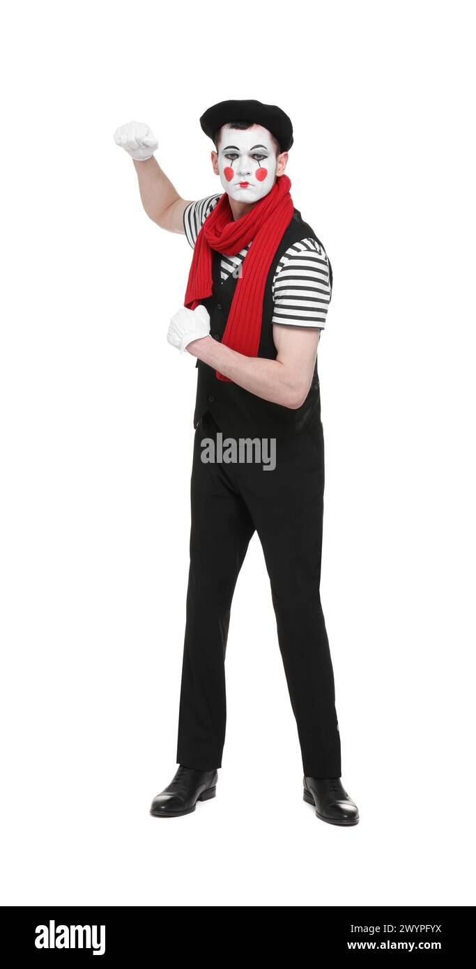 Mime artist in beret posing on white background Stock Photo - Alamy