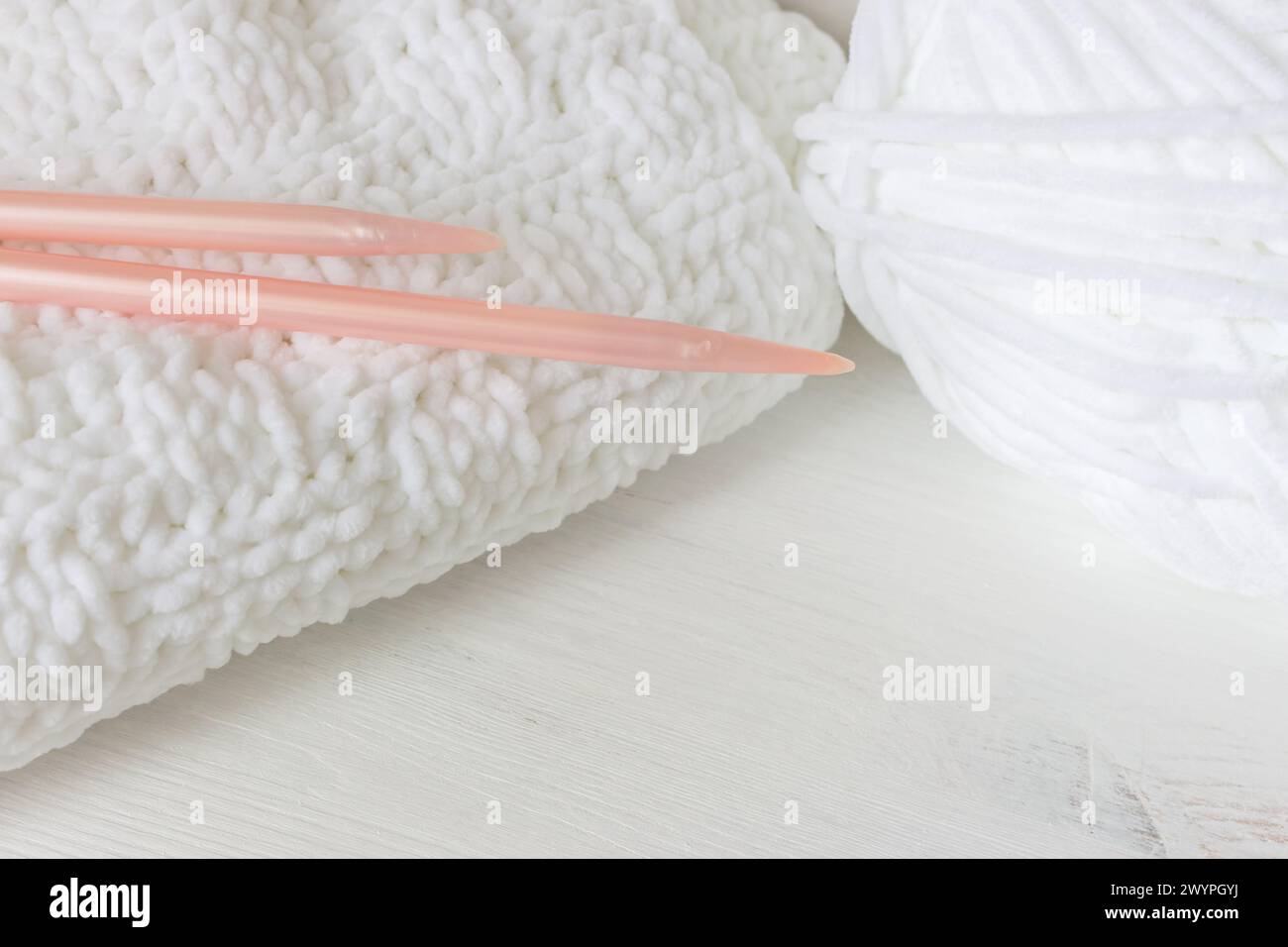 White cotton wool and needles on white wooden background. Soft white ...