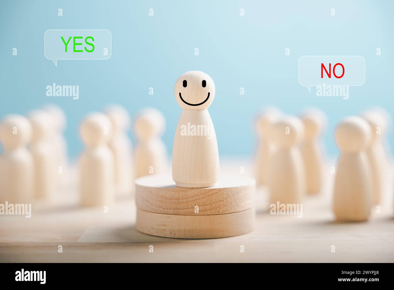 Wooden figures on a cube display yes or no symbols. Depicts open ...