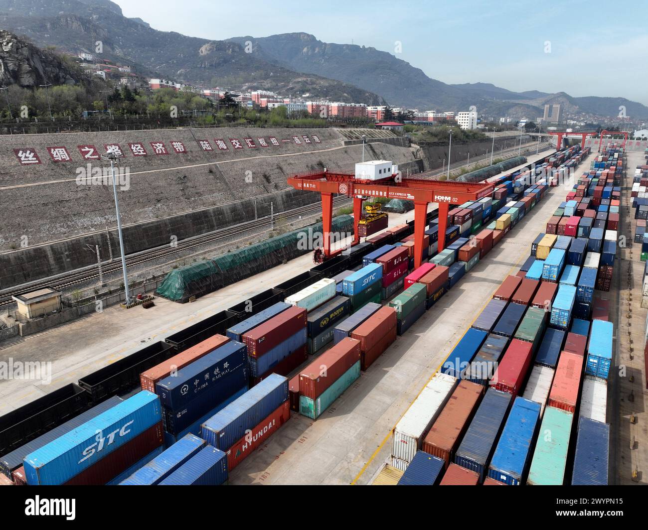 LIANYUNGANG, CHINA - APRIL 8, 2024 - Large machinery is loading ...