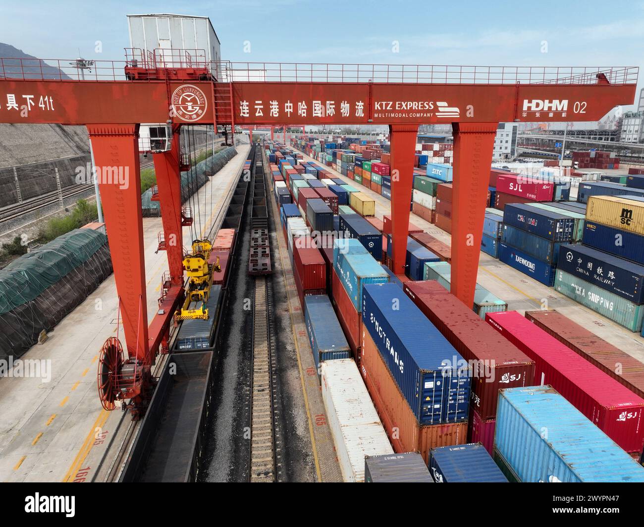LIANYUNGANG, CHINA - APRIL 8, 2024 - Large machinery is loading ...