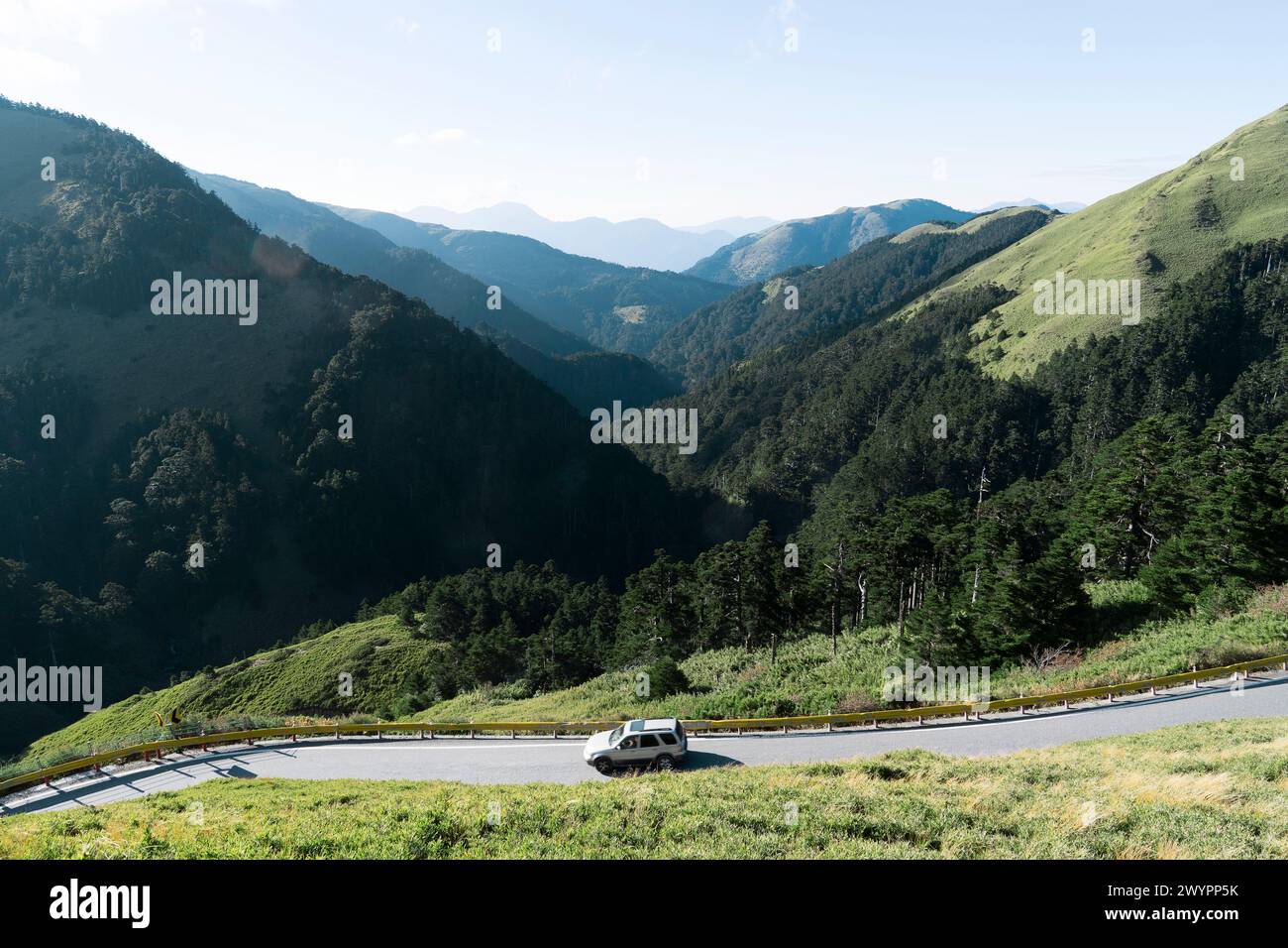 Scenic Mountain Road Trip With Car Driving on the Road Along the ...