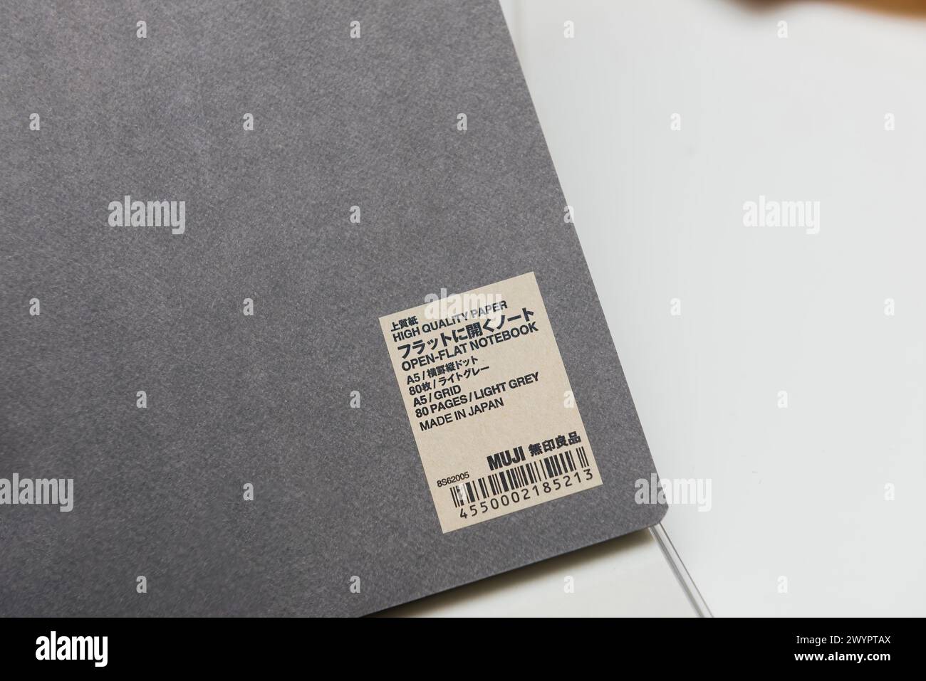 Bremen, Germany - Dec 10, 2021: Open flat notebook crafted by Muji, showcasing superior Japanese ...