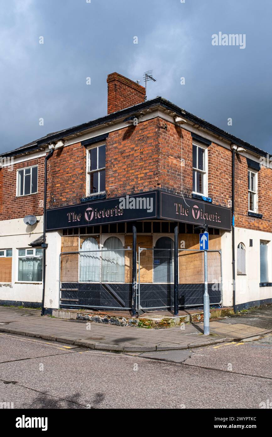 The Victoria pub, closed down and boarded up in town centre of Crewe ...