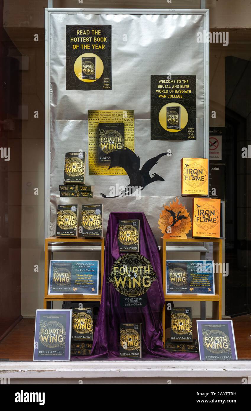 Book display 'Fourth Wing' by Rebecca Yarros in shop window of ...
