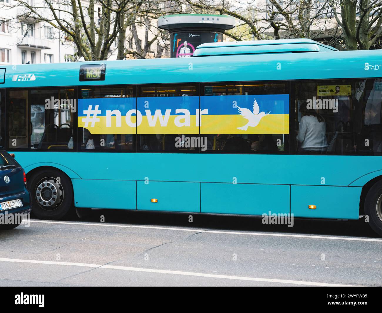 Frankfurt, Germany - Mar 31, 2024: A vibrant blue city bus in Frankfurt ...
