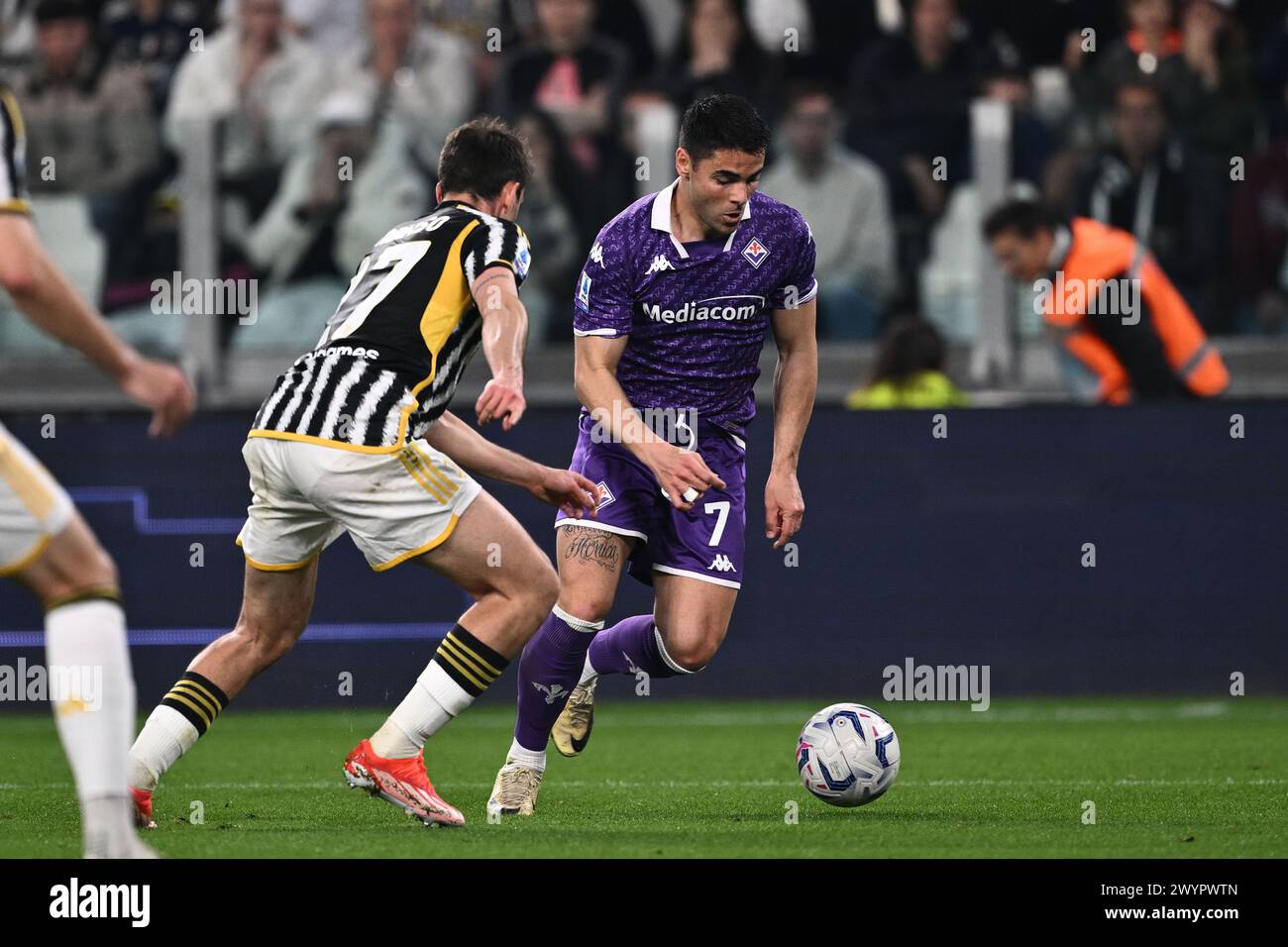 Riccardo Sottil (Fiorentina)Andrea Cambiaso (Juventus) during the ...