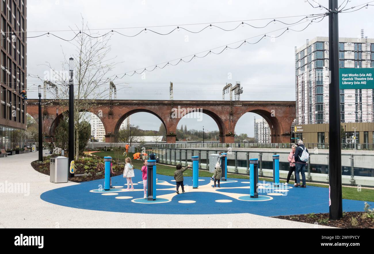 Children playing in the new park above Stockport transport interchange ...