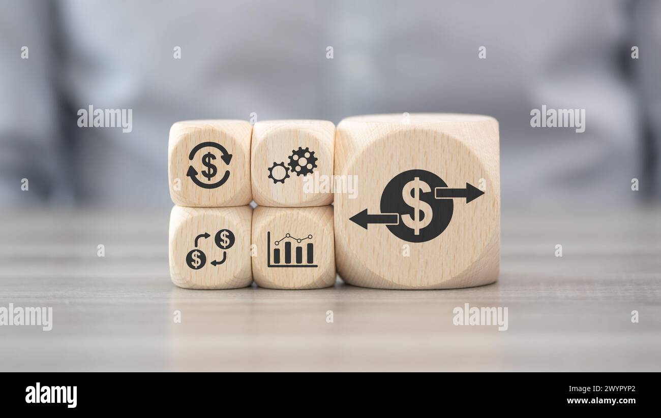 Wooden blocks with symbol of money transfer concept Stock Photo - Alamy