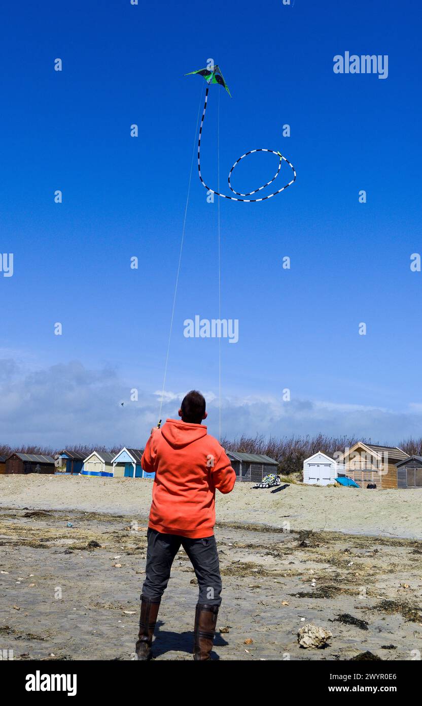 Man flying a stunt -kite on West Wittering beach near Chichester ...