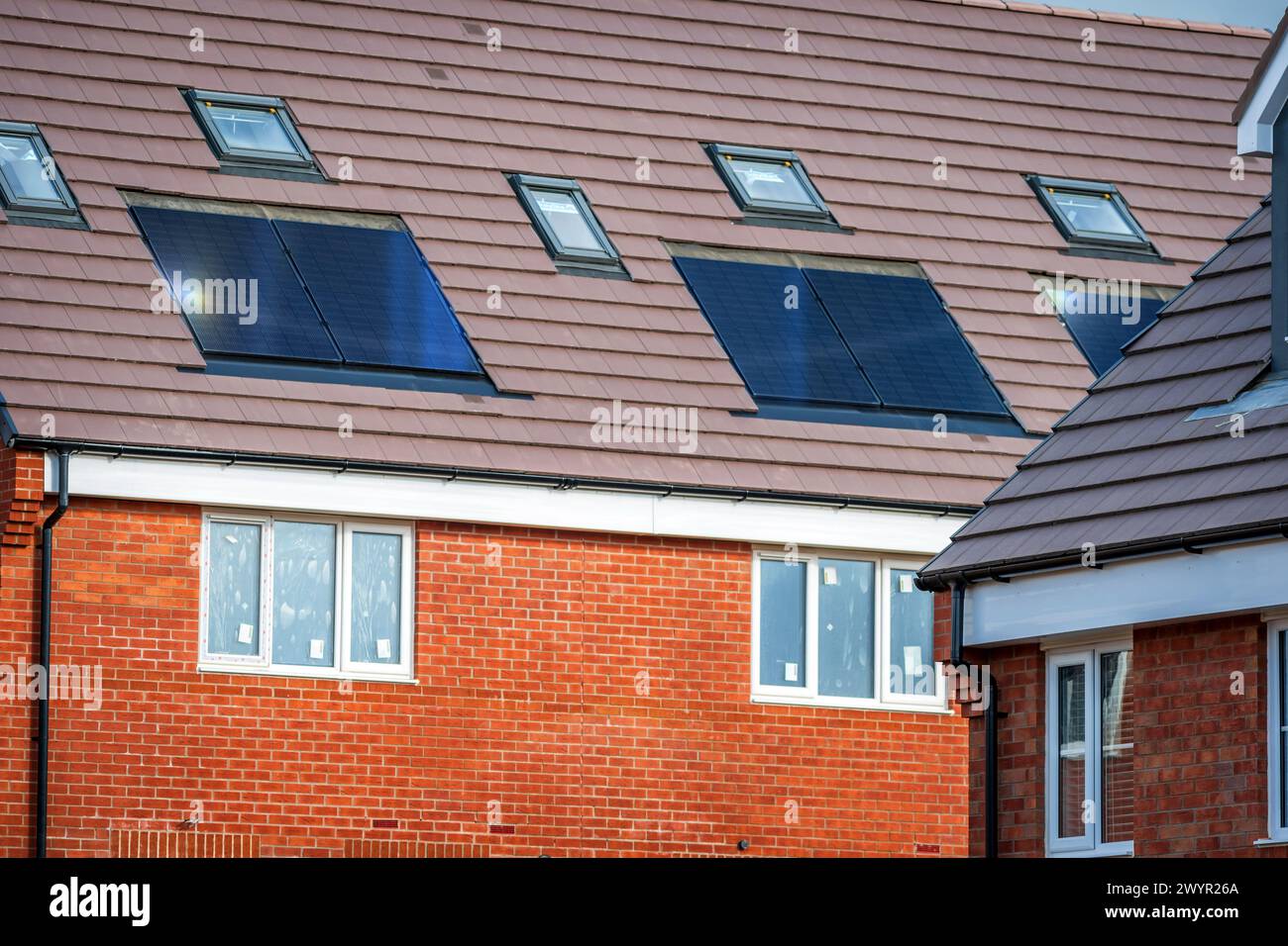 Solar energy panel on new built house roof in england uk Stock Photo ...