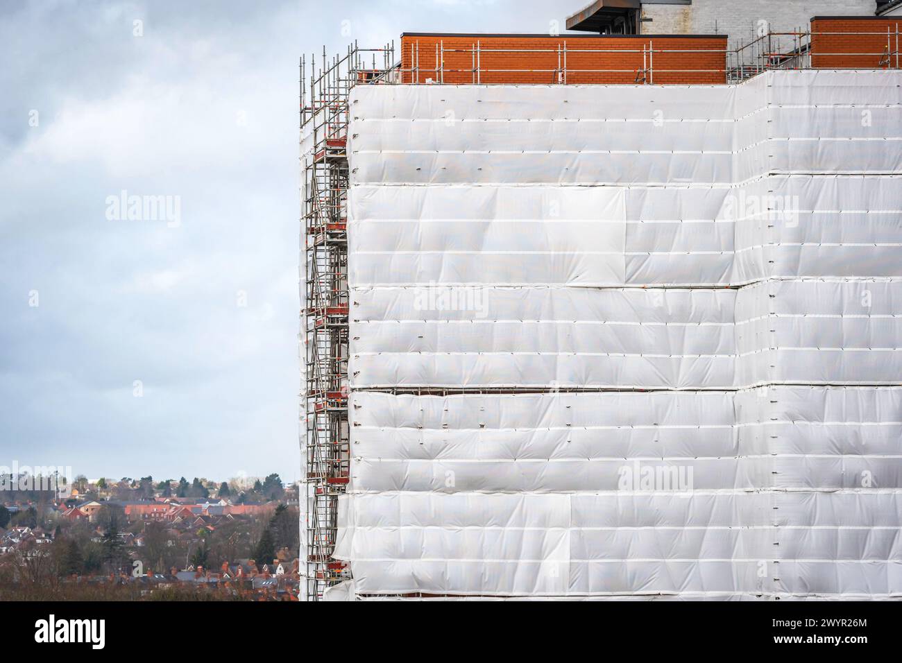 Flame retardant scaffold sheeting wrapped apartments building during ...